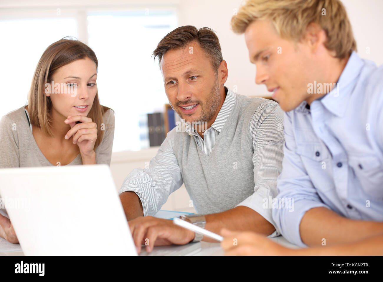 Business team working on project Stock Photo - Alamy