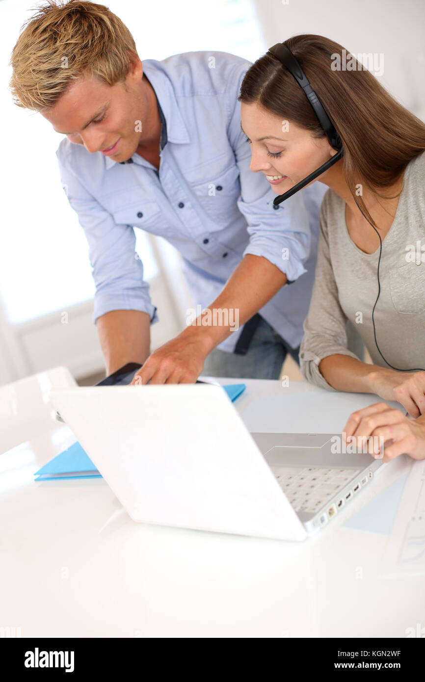 Business team calling client on the phone Stock Photo - Alamy