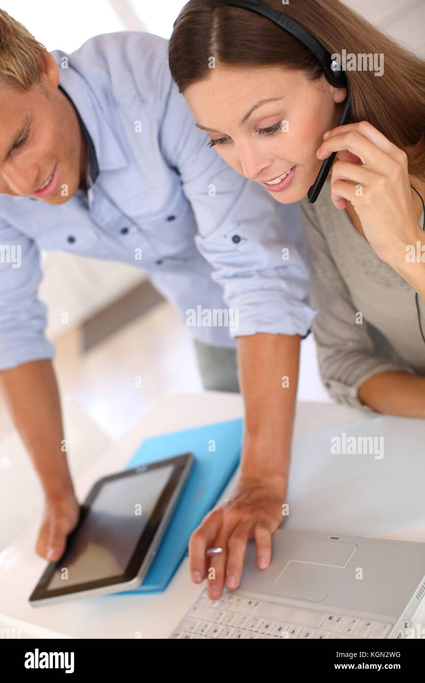 Business team calling client on the phone Stock Photo - Alamy