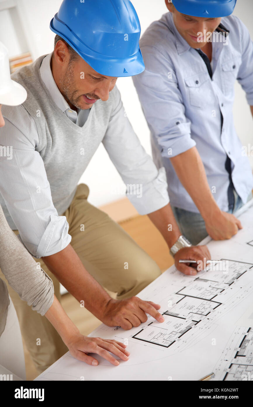 Construction people working on project Stock Photo - Alamy