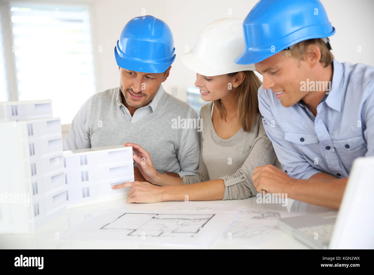 Construction people working on project Stock Photo - Alamy
