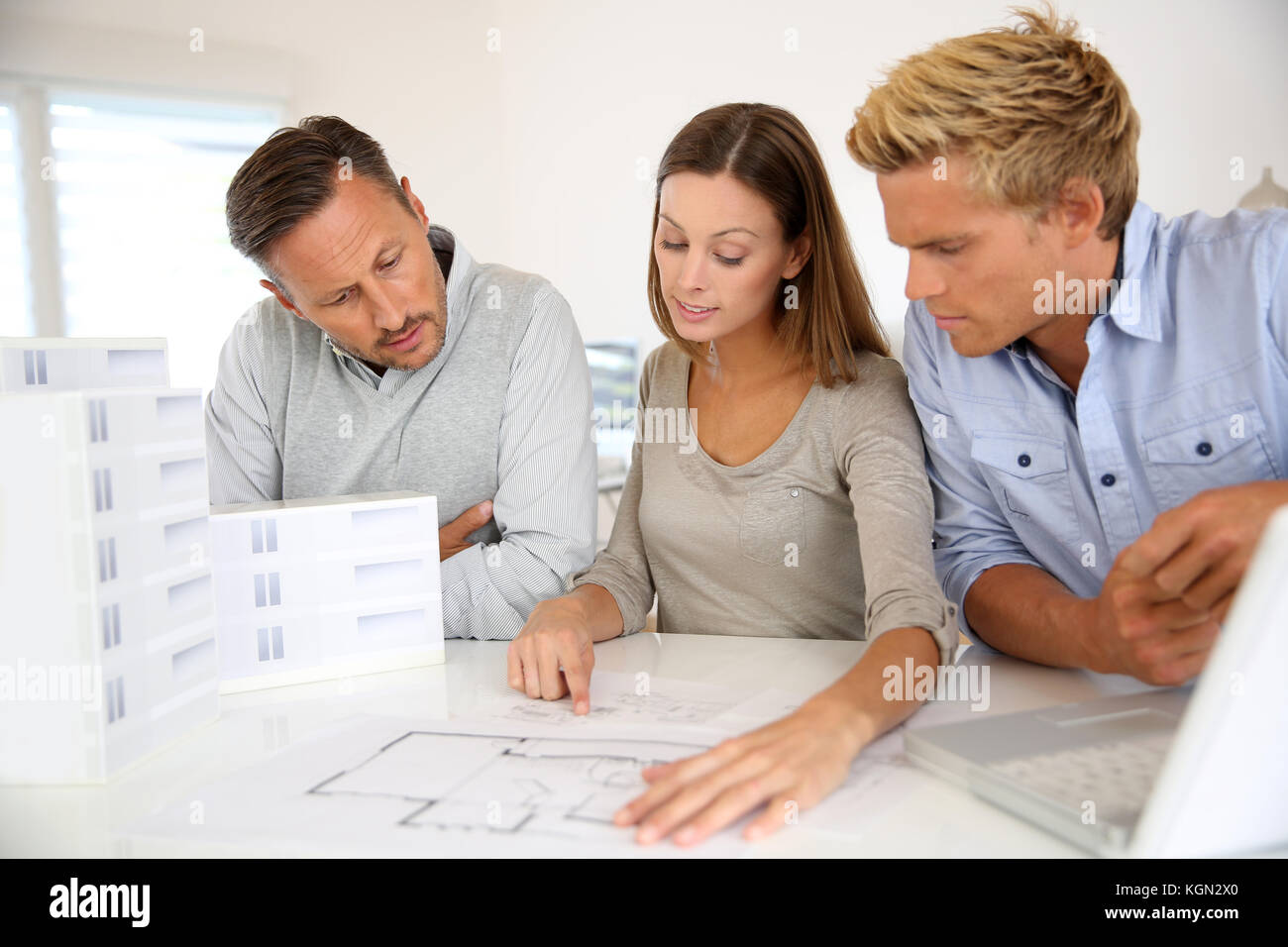 Team of architects meeting in office Stock Photo - Alamy