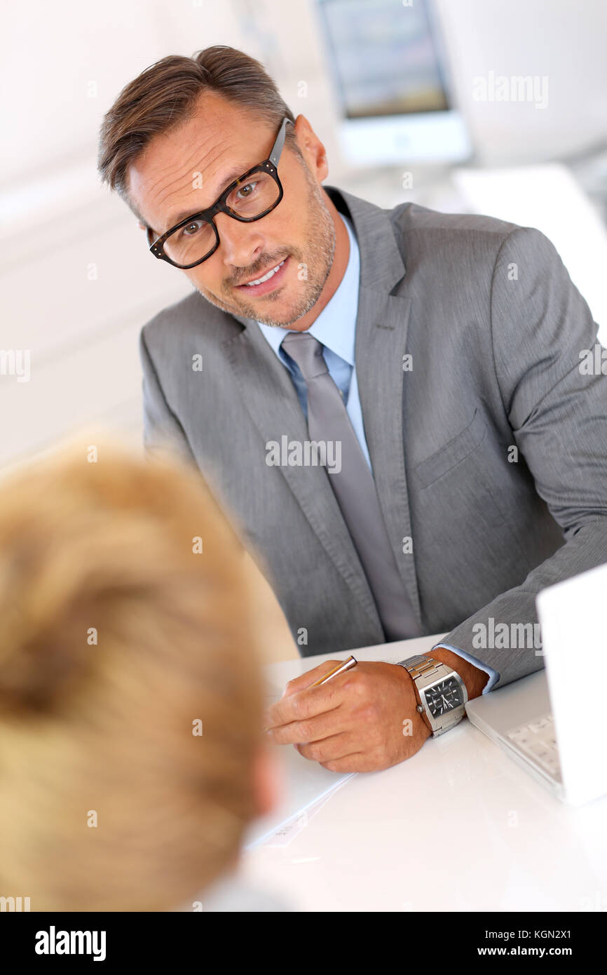 Human ressources manager giving a job interview Stock Photo - Alamy