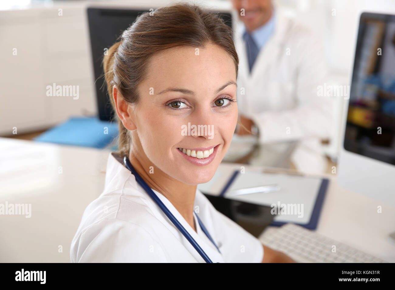 Beautiful nurse working in hospital office Stock Photo - Alamy