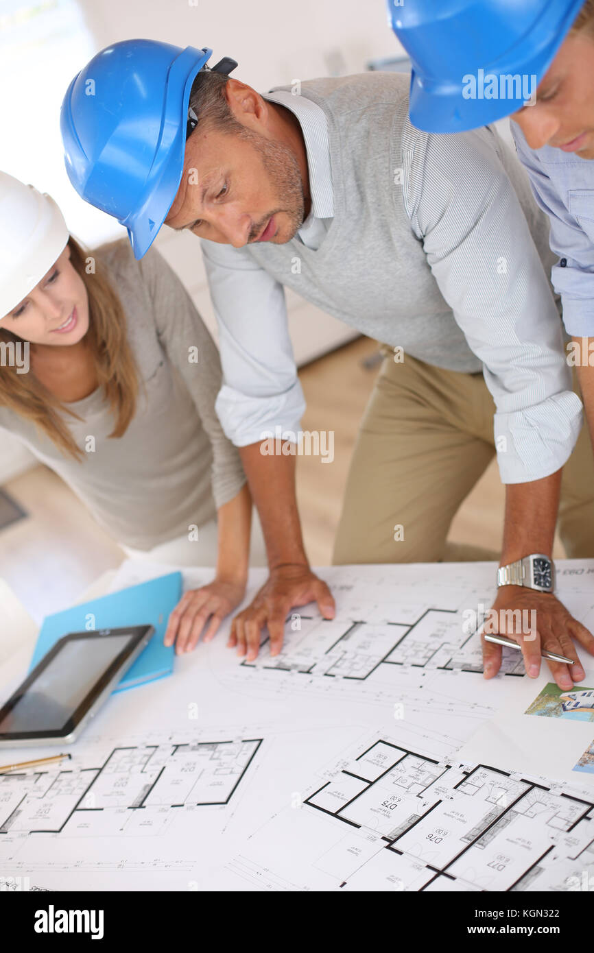 Construction people working on project Stock Photo - Alamy