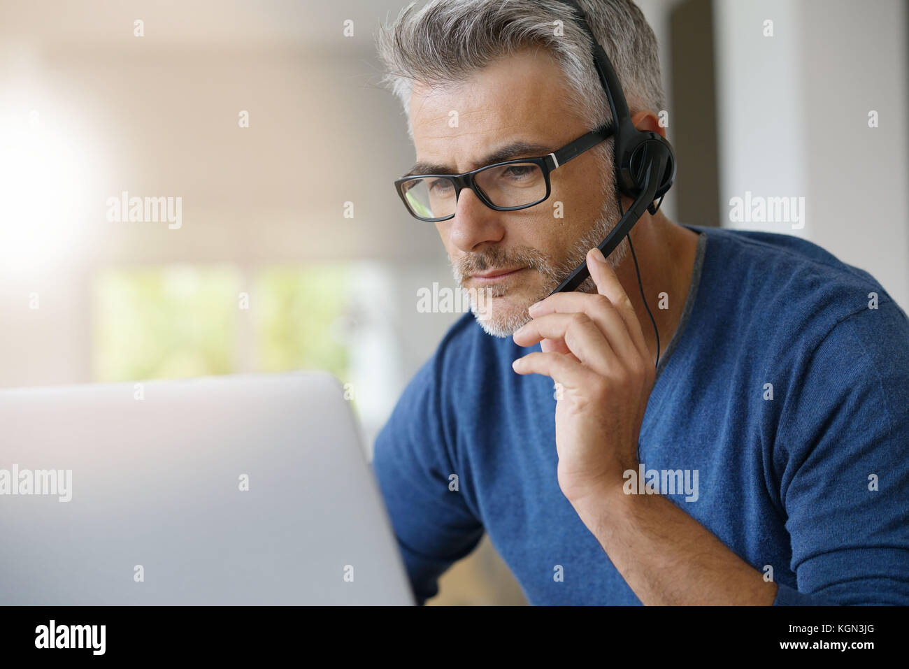 Sales representative teleworking from home-office Stock Photo - Alamy