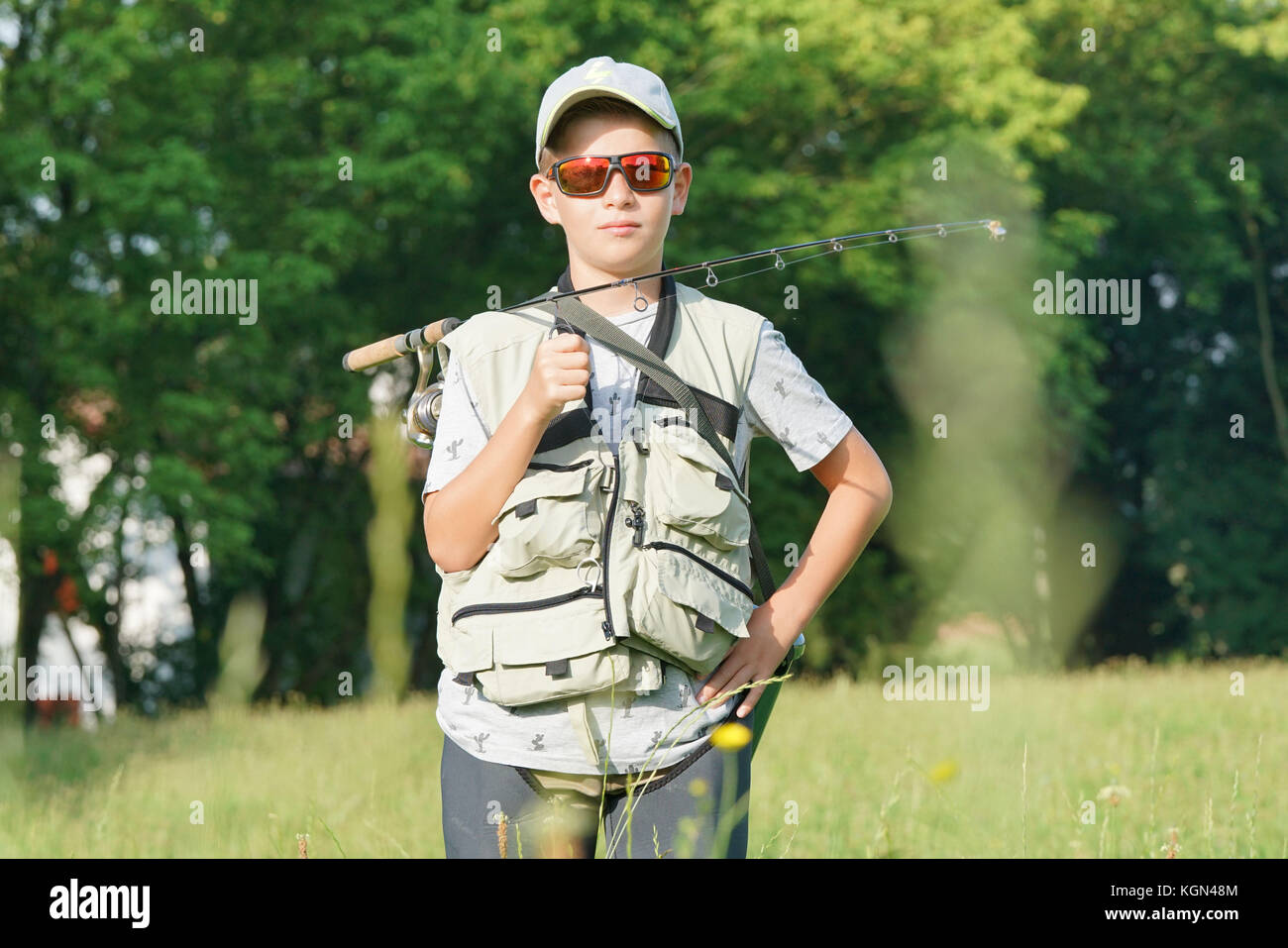 Boy fishing hi-res stock photography and images - Alamy