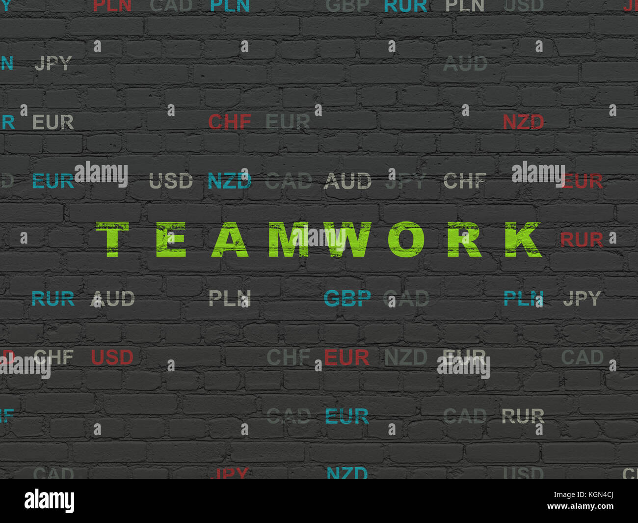 Finance concept: Teamwork on wall background Stock Photo - Alamy