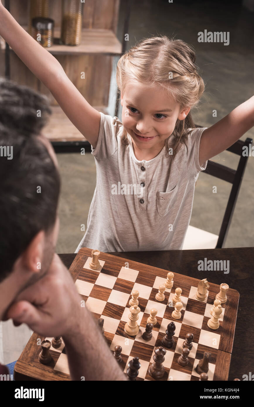 daughter winning chess game Stock Photo - Alamy