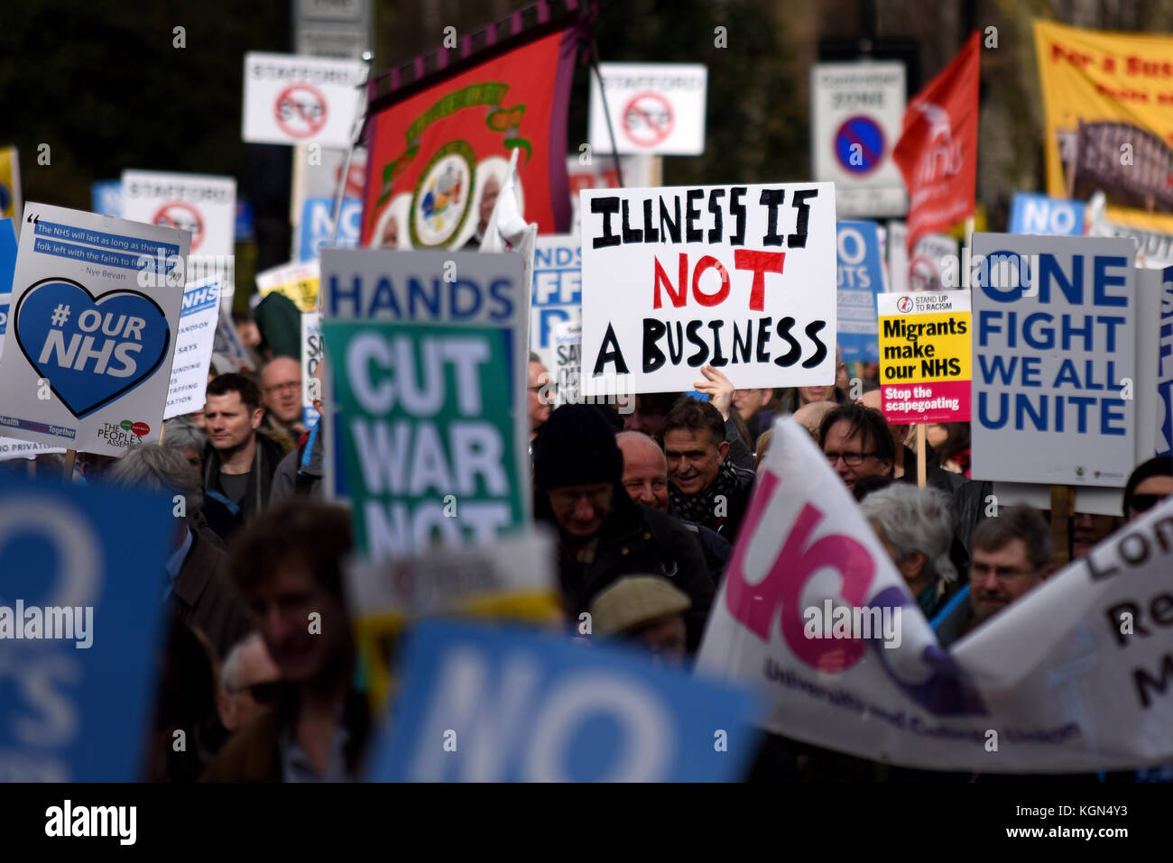 Illness is not a business placard during Our NHS protest demonstration ...