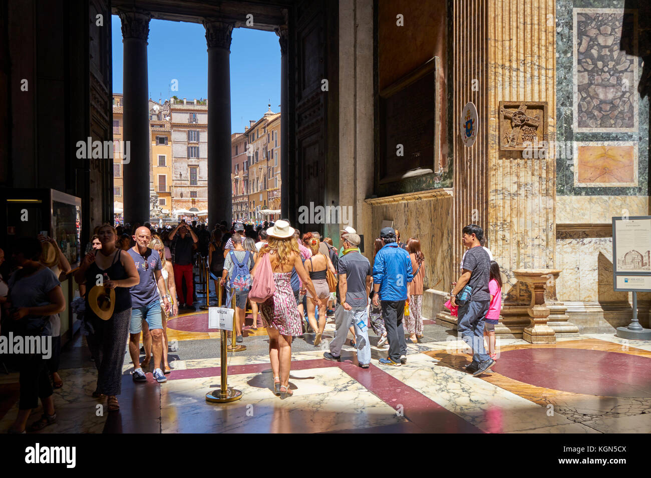 Tourists entering and leaving the interior of Pantheon, Rome, Italy ...