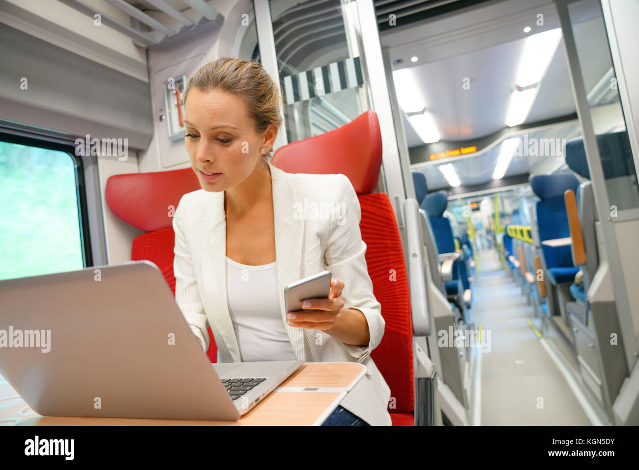 Business woman on train hi-res stock photography and images - Alamy