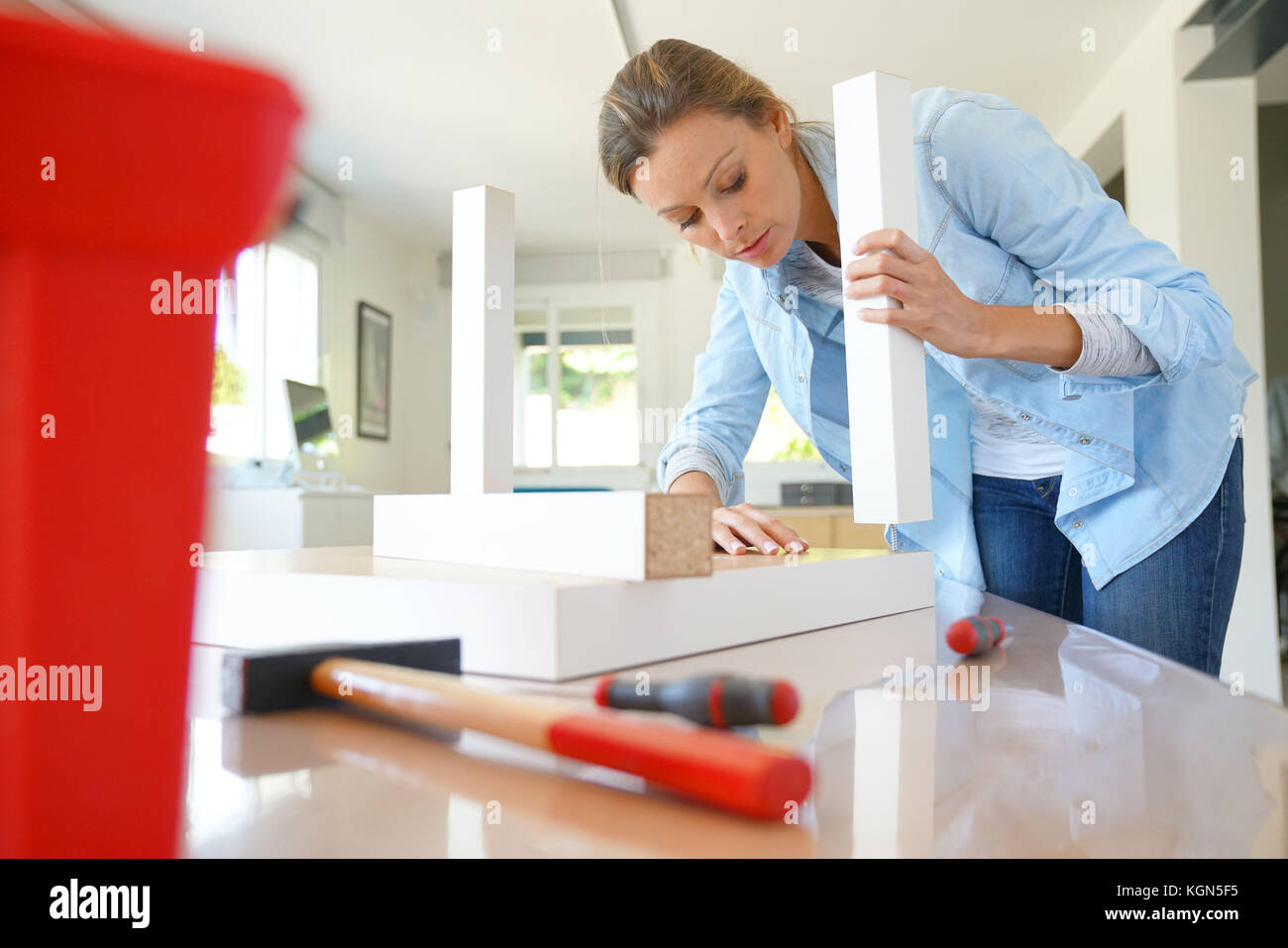 Assembling furniture hi-res stock photography and images - Alamy