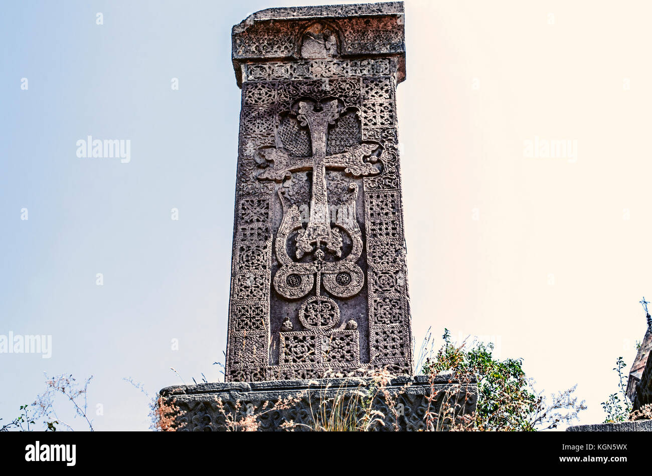 Medieval khachkar covered with ornament and the image of the Madonna ...