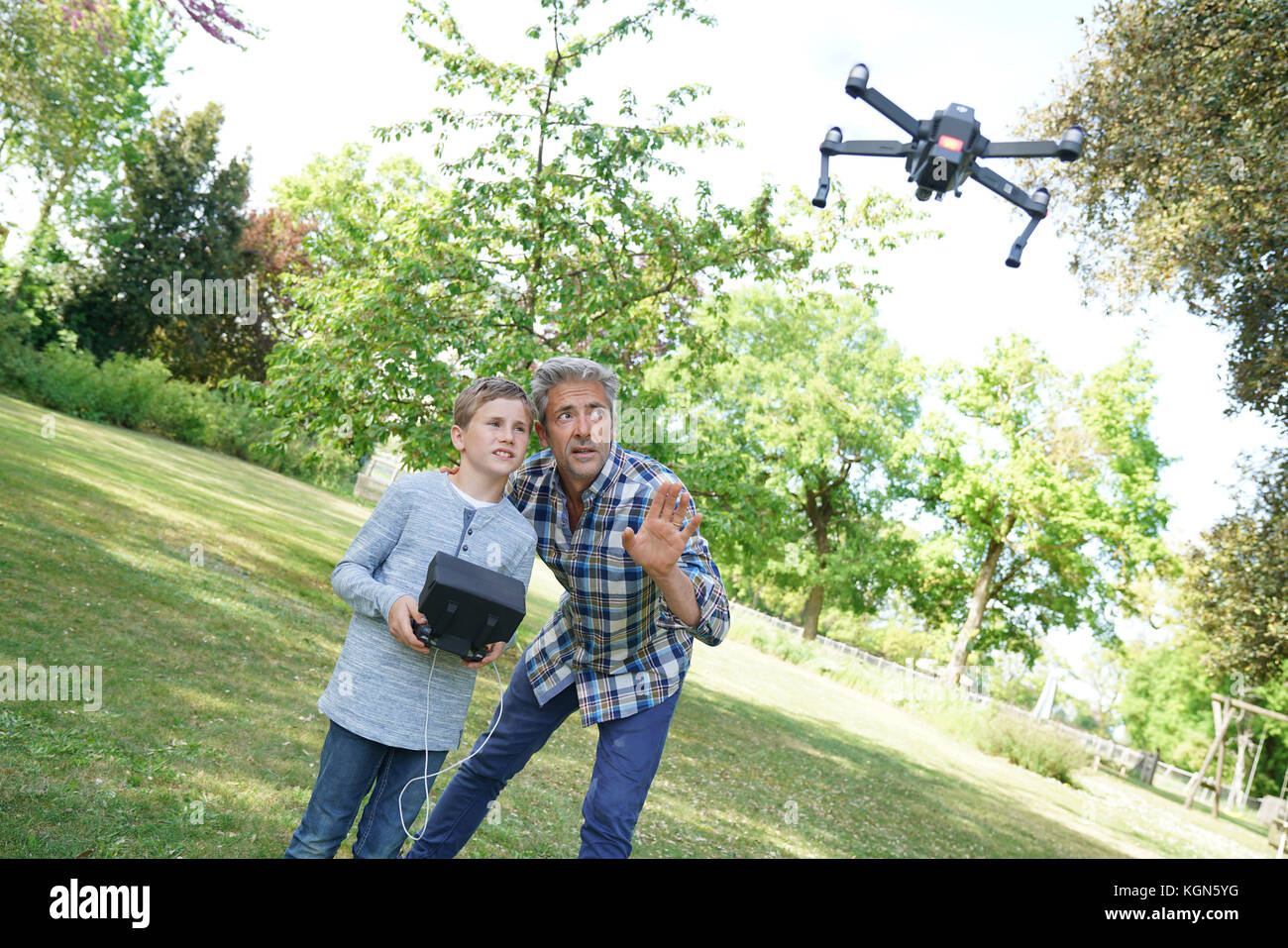 Kid flying drone hi-res stock photography and images - Alamy