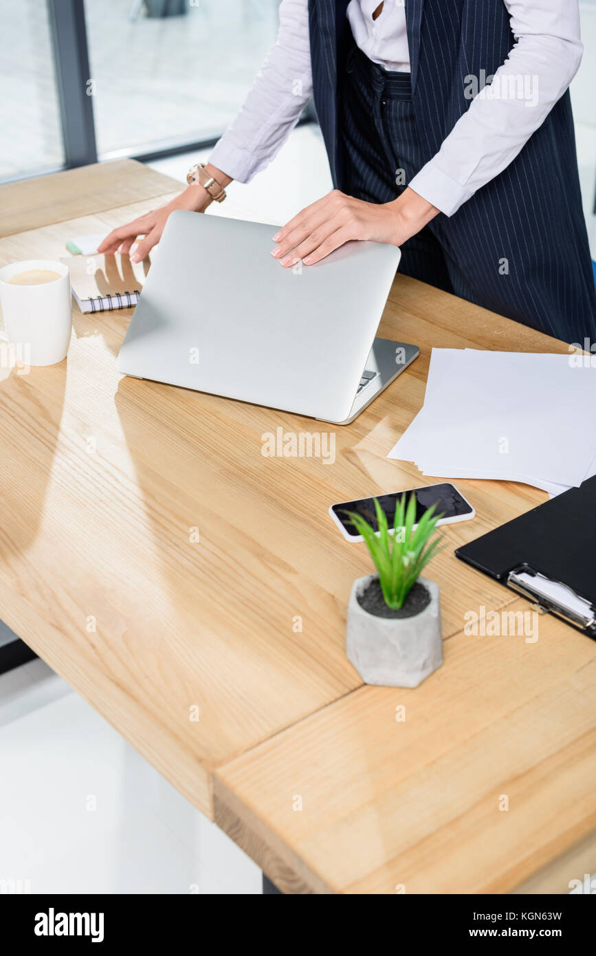 Closing laptop office hi-res stock photography and images - Alamy