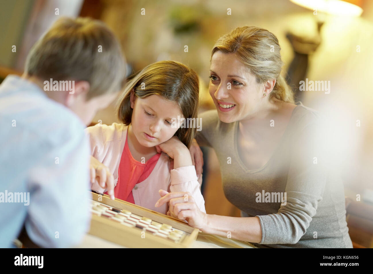 Playing checkers family hi-res stock photography and images - Alamy