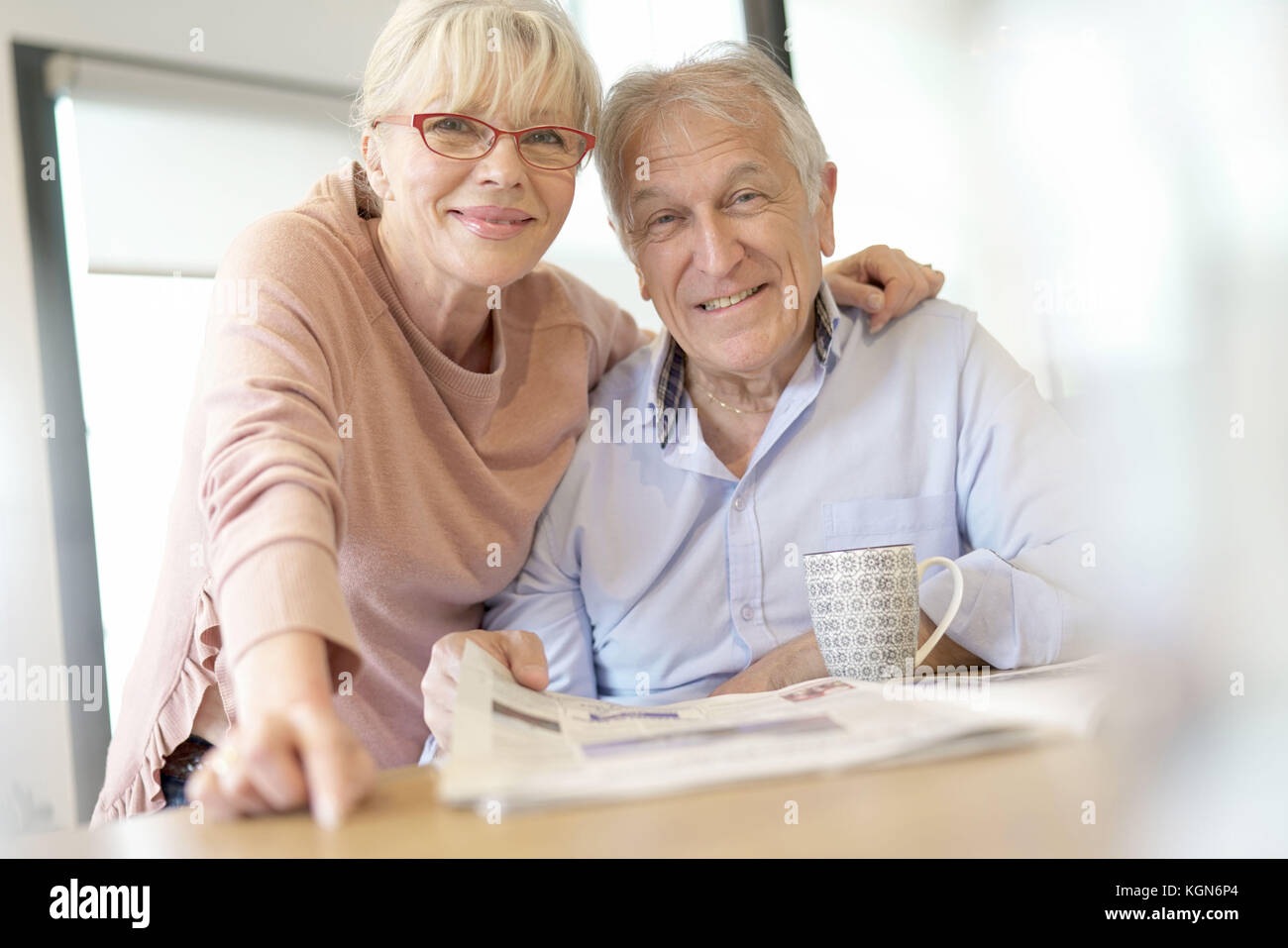 Reading newspaper together hi-res stock photography and images - Alamy