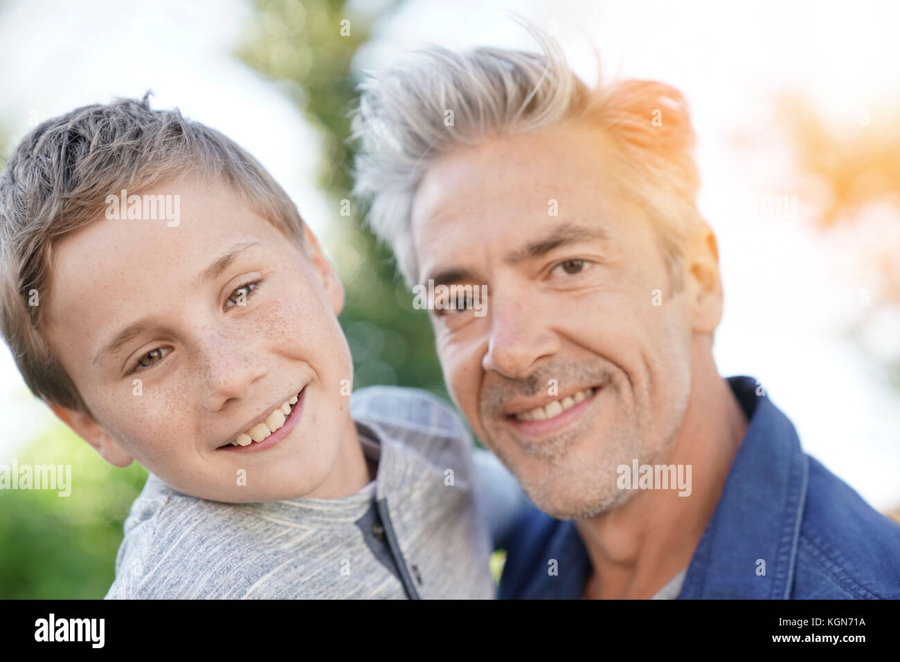 Portrait of father and son Stock Photo - Alamy