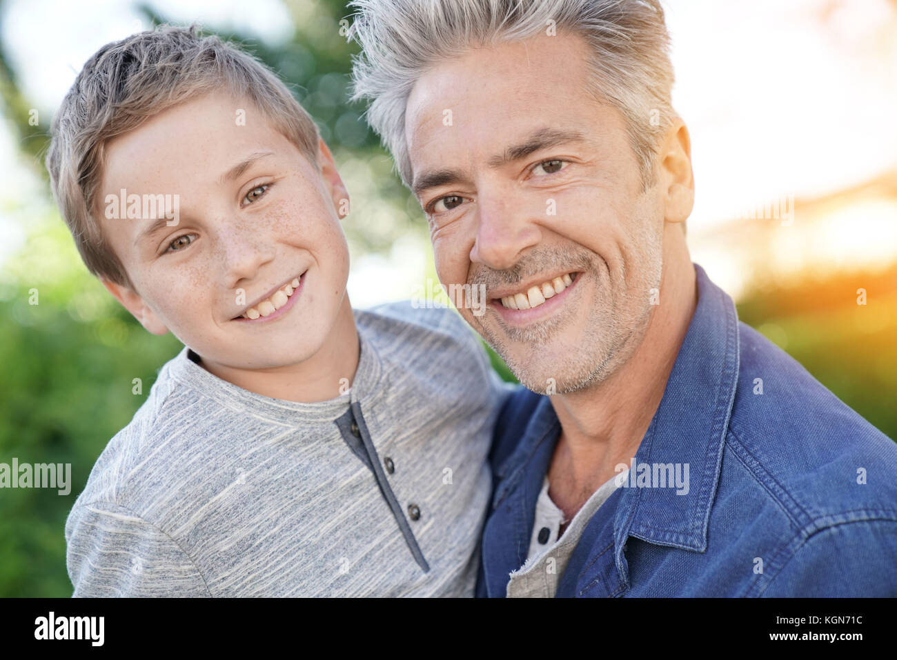 Portrait of father and son Stock Photo - Alamy