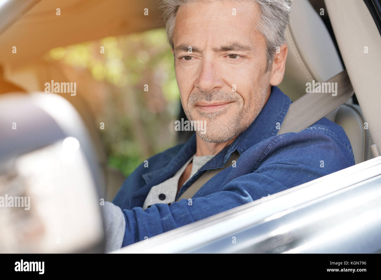 Old person driving hi-res stock photography and images - Alamy