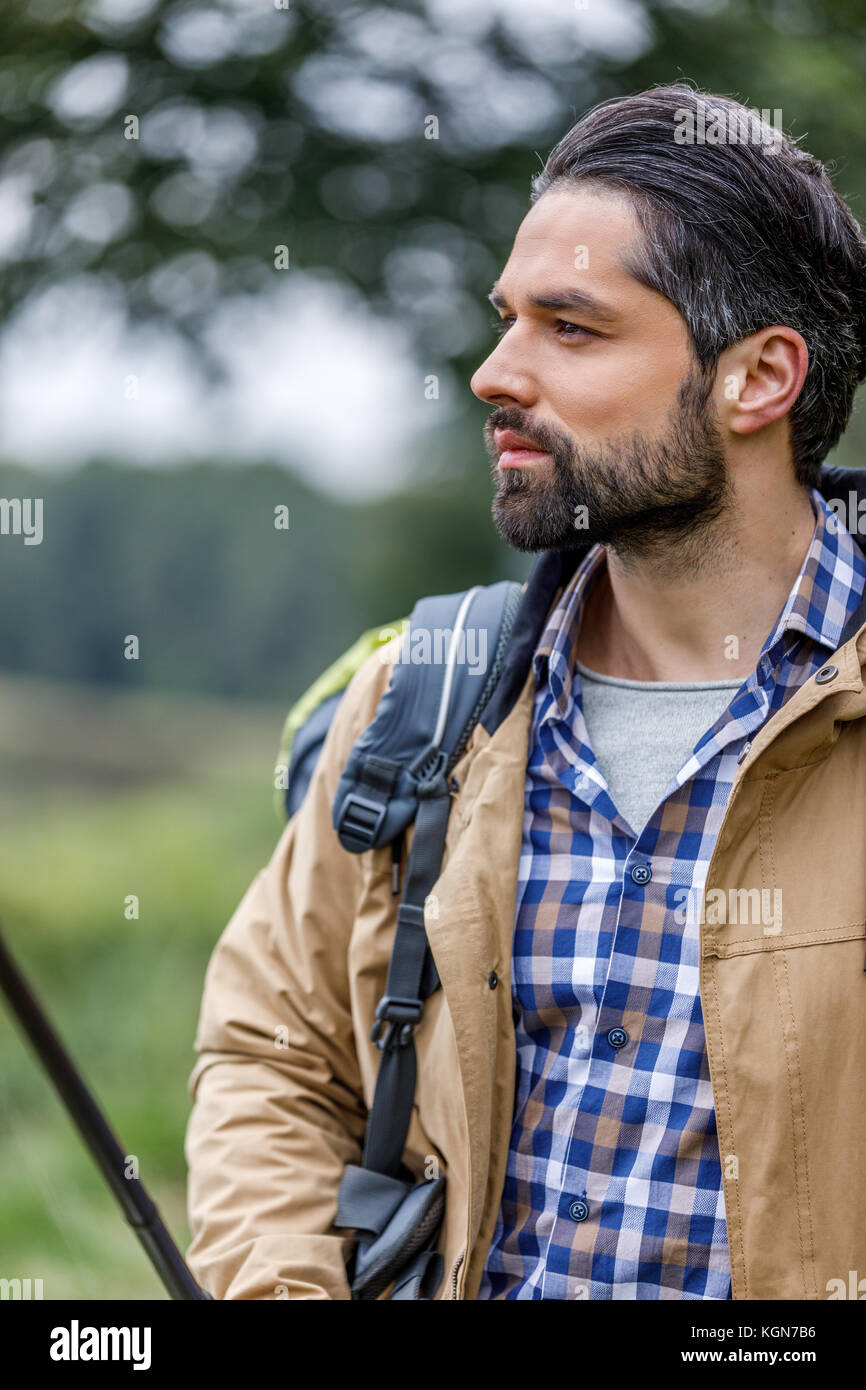 handsome man with backpack Stock Photo - Alamy