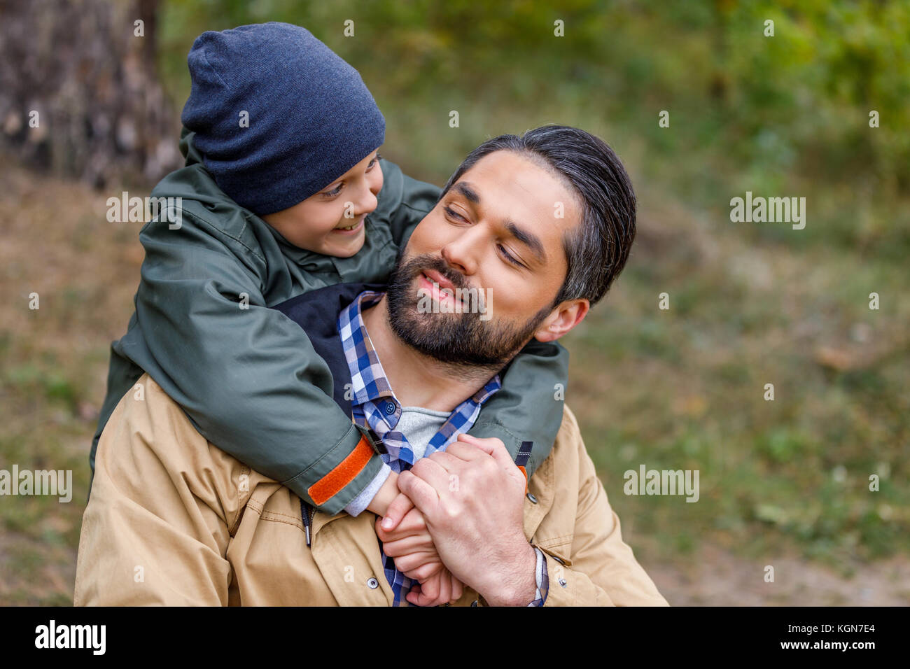 Son hugging father hi-res stock photography and images - Alamy