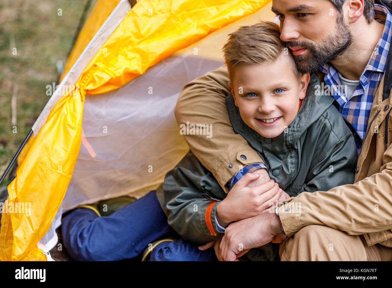 father and son in tent Stock Photo - Alamy