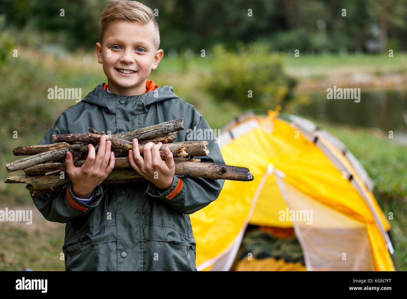 Holding sticks camp hi-res stock photography and images - Alamy