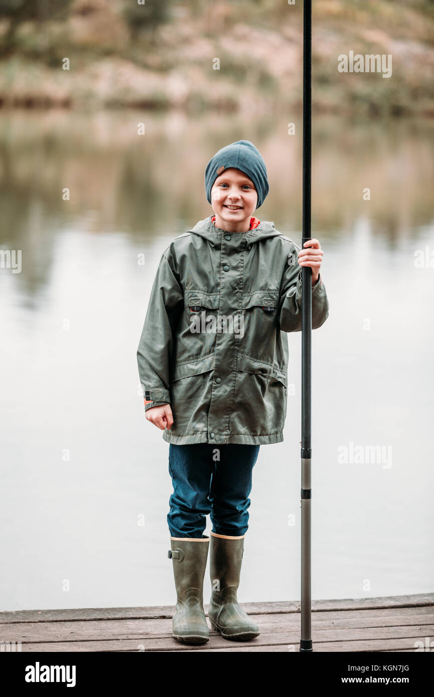 little boy with rod Stock Photo - Alamy