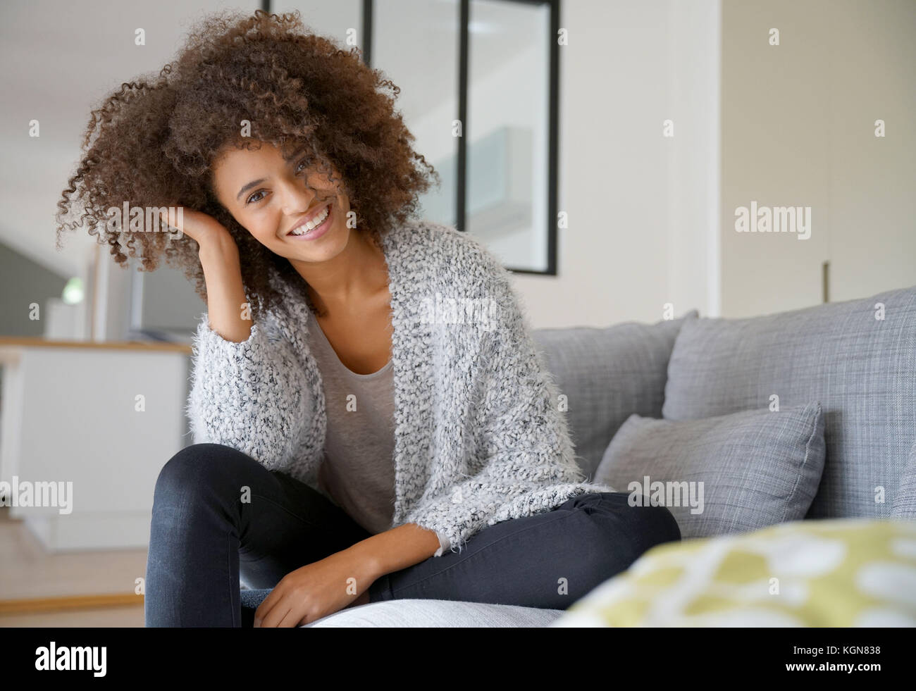 Attractive mixed-race woman relaxing on sofa Stock Photo - Alamy Attractive mixed-race woman relaxing on sofa Stock Photo - Alamy