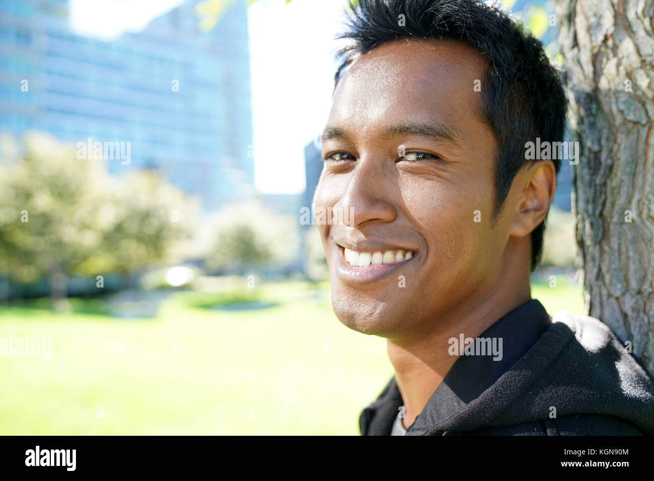 Closeup of asian type man relaxing at the park Stock Photo - Alamy