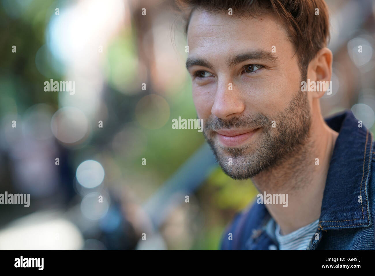 Cheerful man walking in the street, NYC tour Stock Photo - Alamy