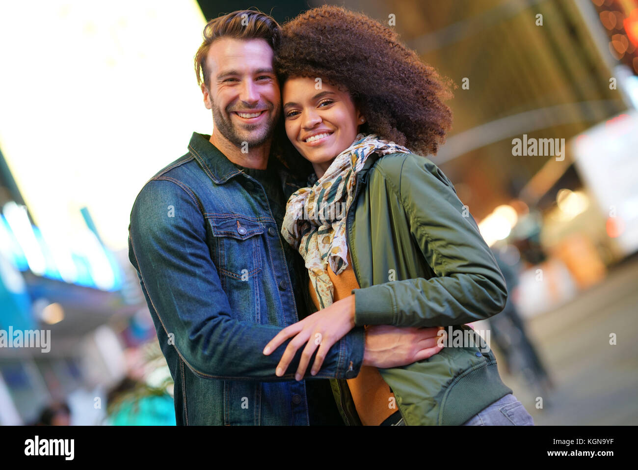 Couple enjoying Times Square panorama Stock Photo - Alamy