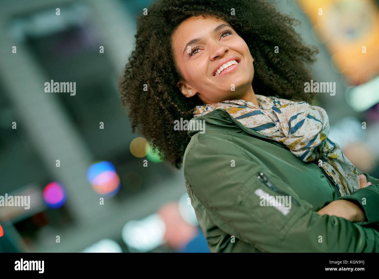 Cheerful mixed race girl at Times Square enjoying lights Stock Photo ...