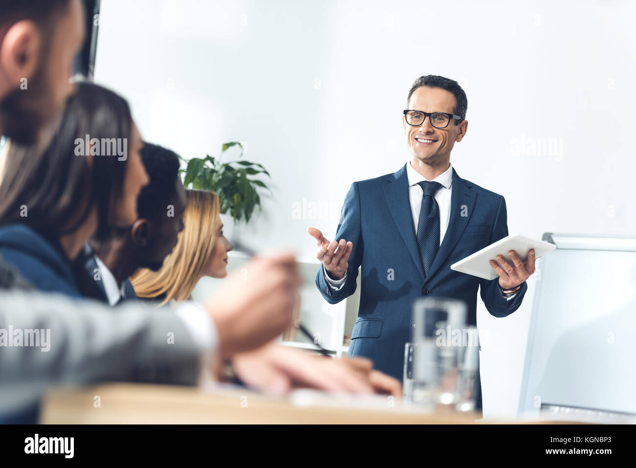 Female caucasian team leader tablet hi-res stock photography and images ...