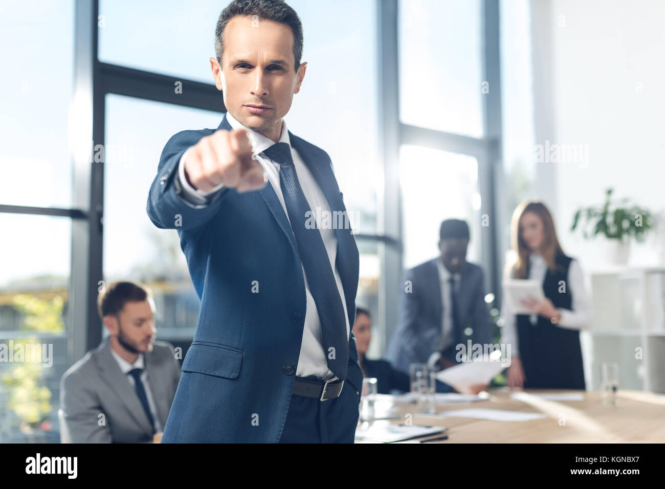 businessman pointing at camera Stock Photo - Alamy