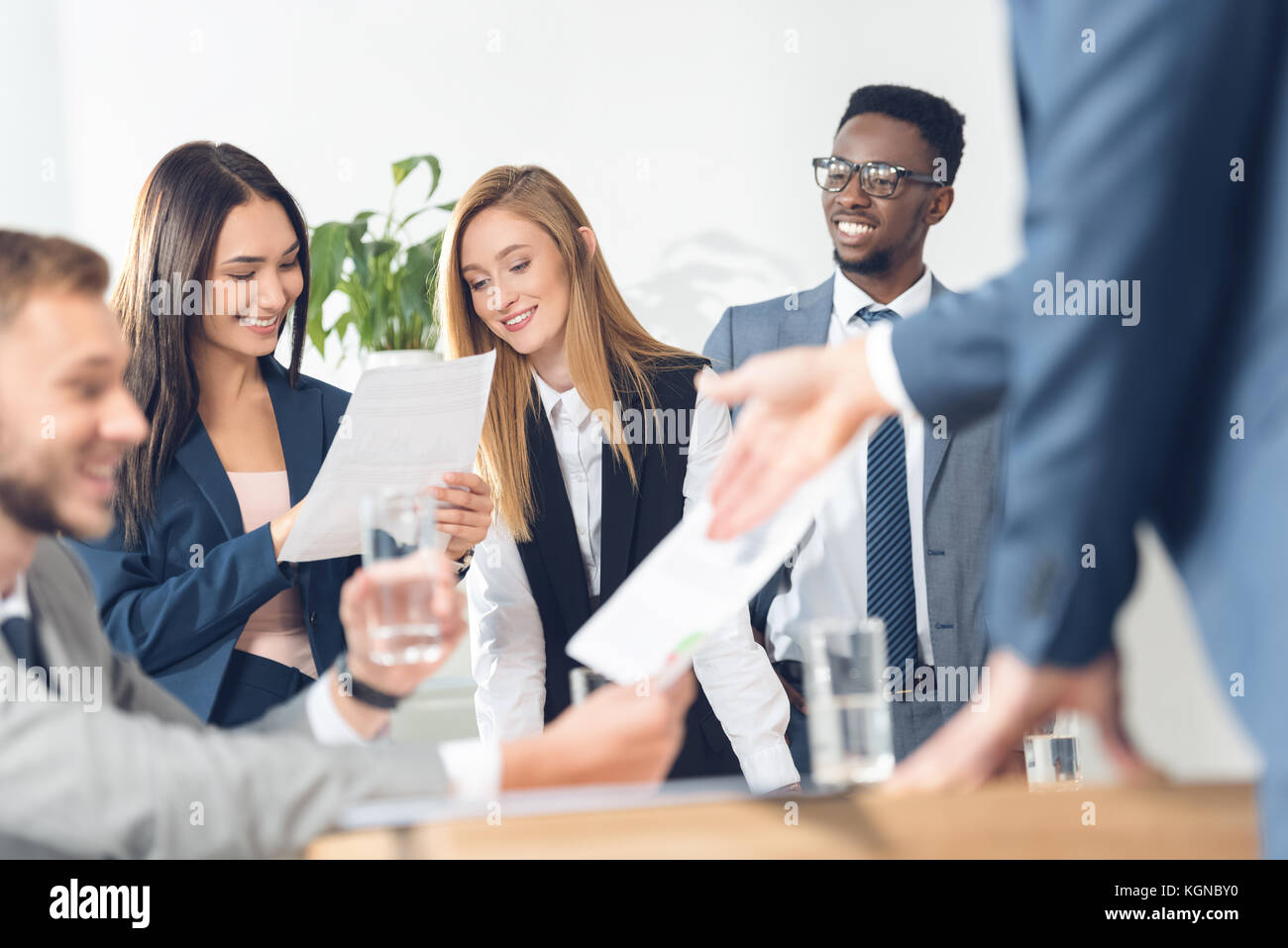 Female executive looking documents hi-res stock photography and images ...