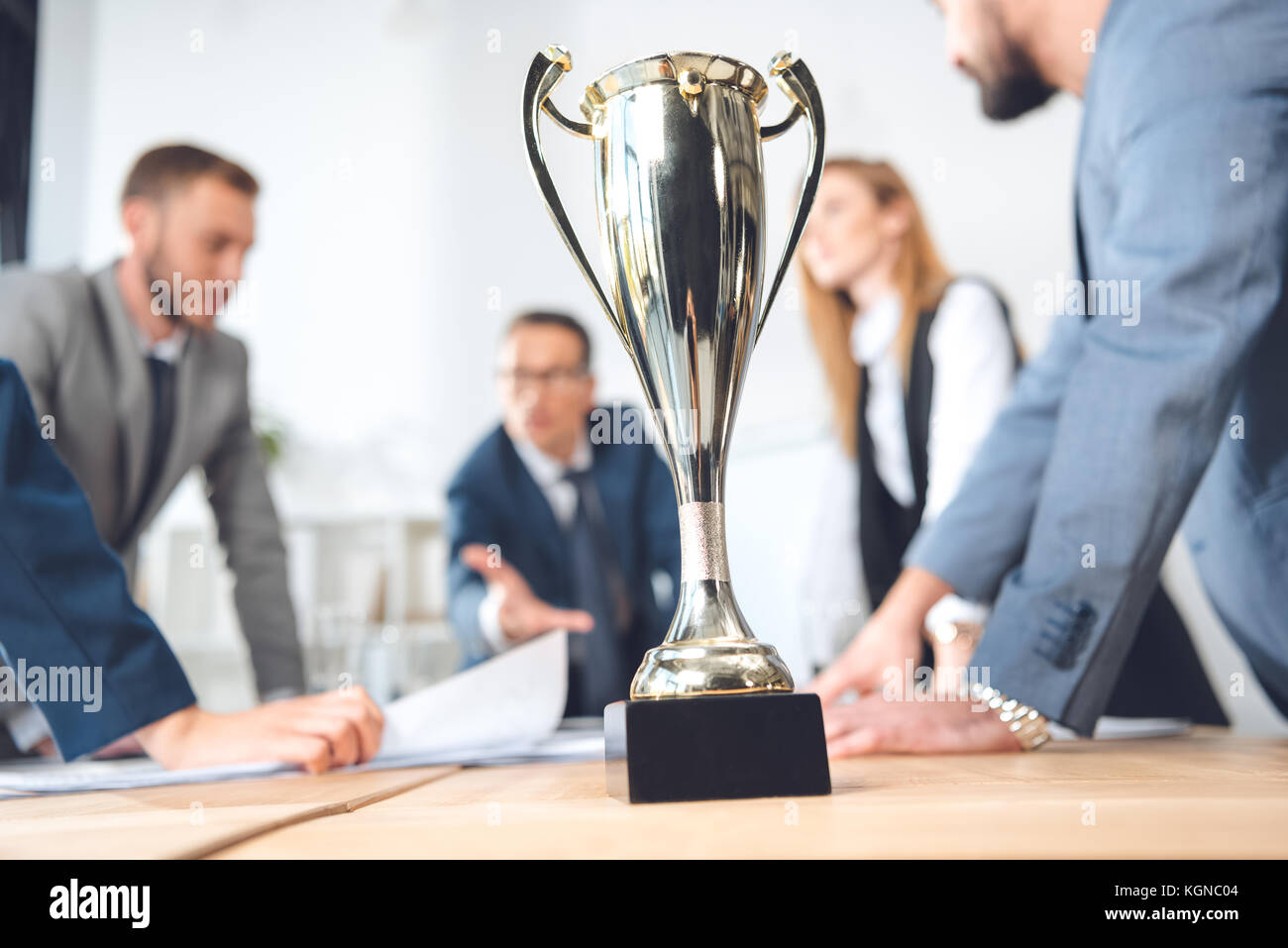 champion cup standing in office Stock Photo - Alamy