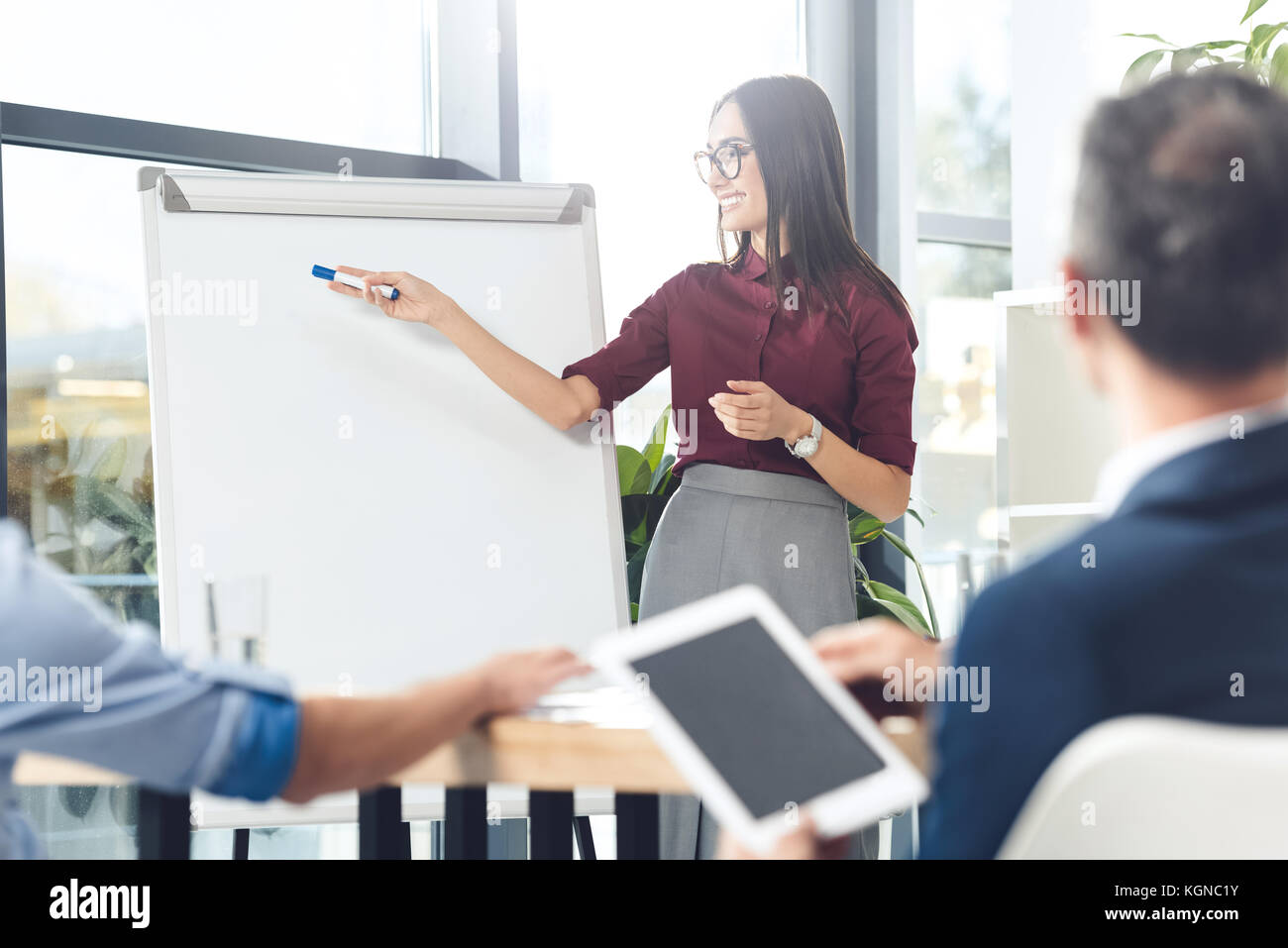 businesswoman giving presentation Stock Photo - Alamy