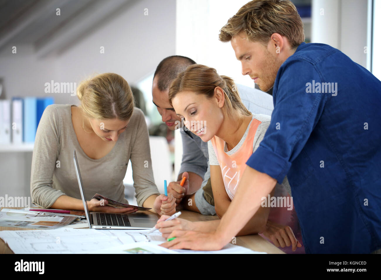 Group of students working on construction project Stock Photo - Alamy