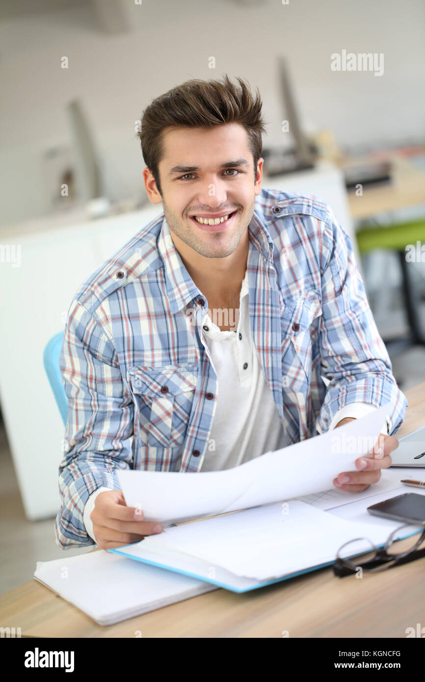 Student doing a training period in office Stock Photo - Alamy