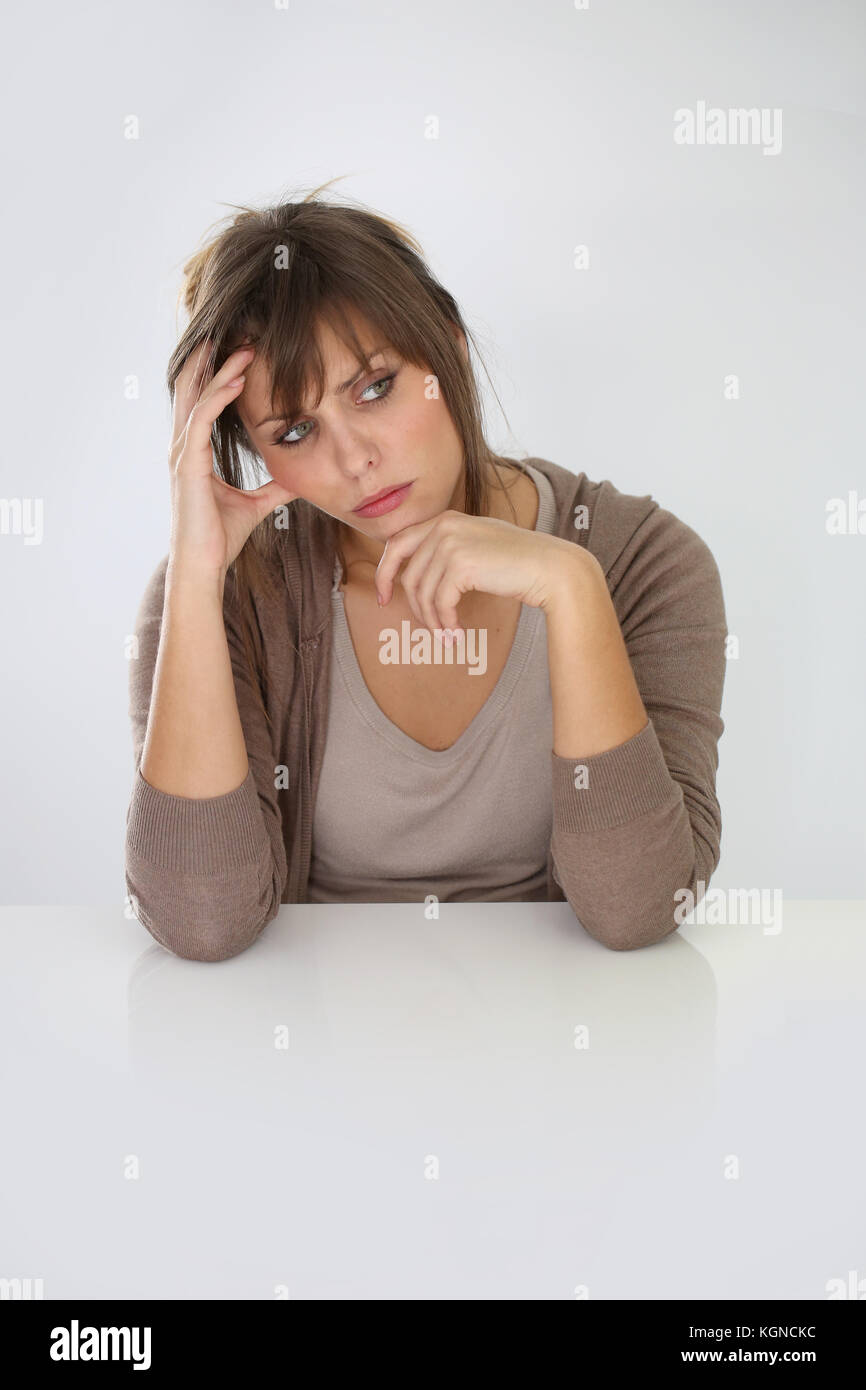 Portrait of young woman being tired, isolated Stock Photo - Alamy