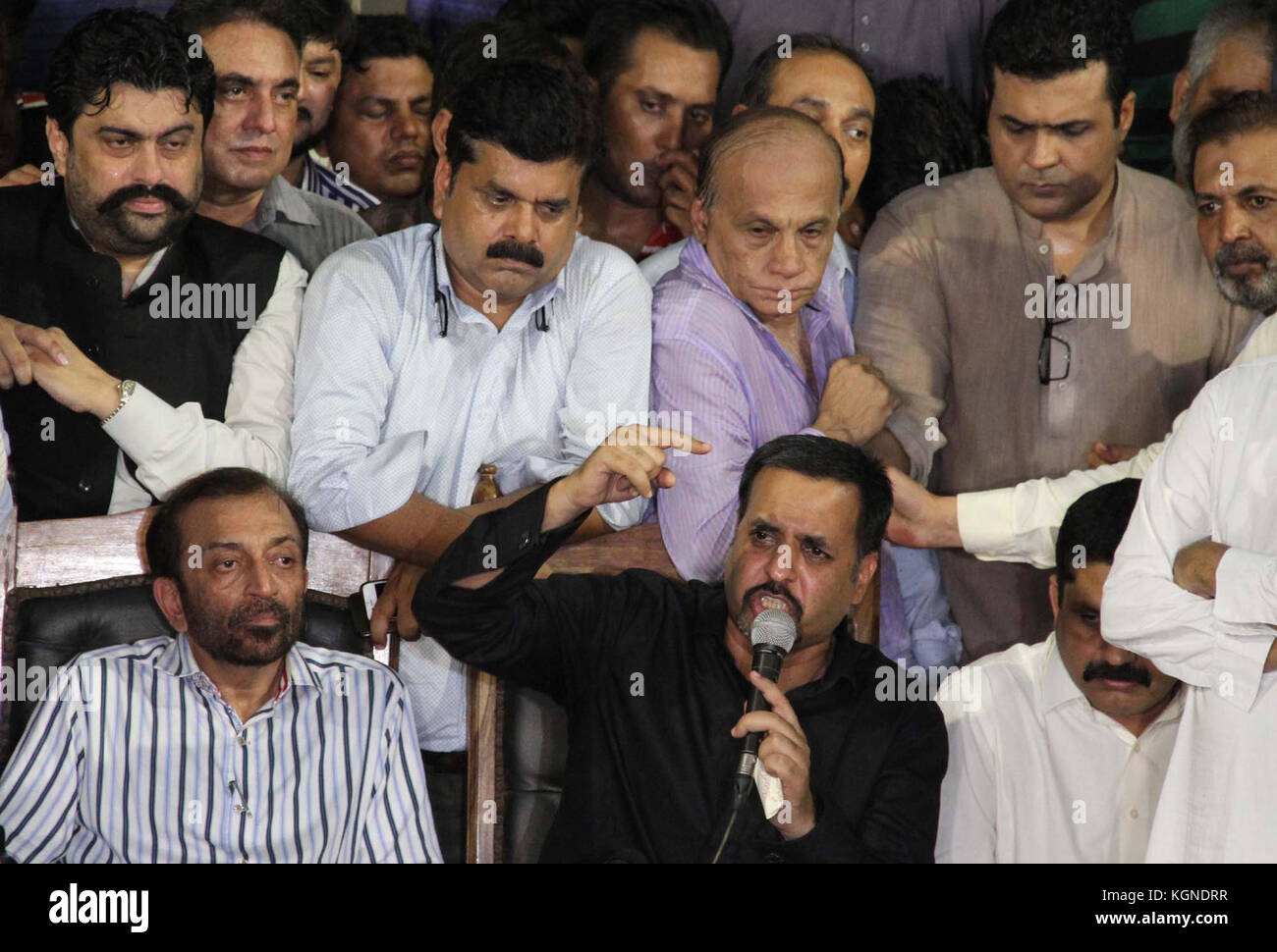 Flanked by MQM-Pak Chief Dr. Farooq Sattar, the Chief of Pak Sarzameen ...