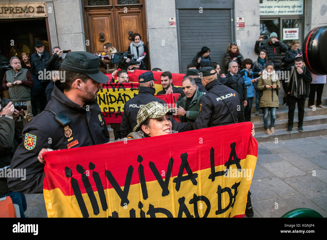 Madrid, Spain. 9 Nov, 2017. Pro-unity protesters hold Spanish flags as ...