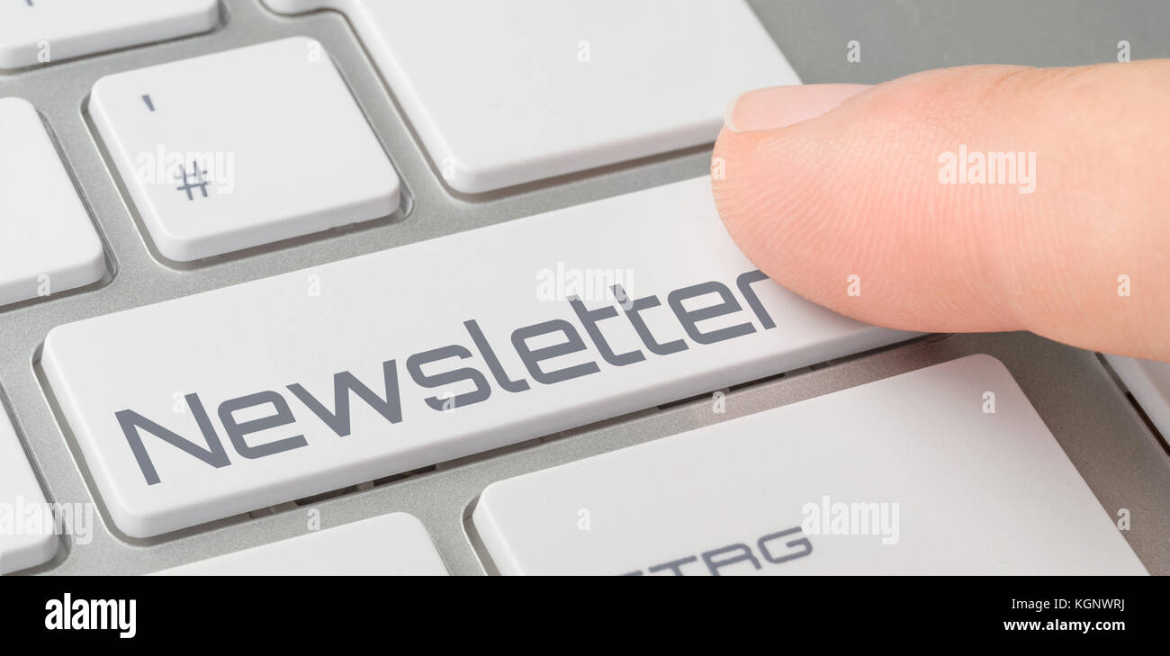 A keyboard with a labeled button - Newsletter Stock Photo - Alamy