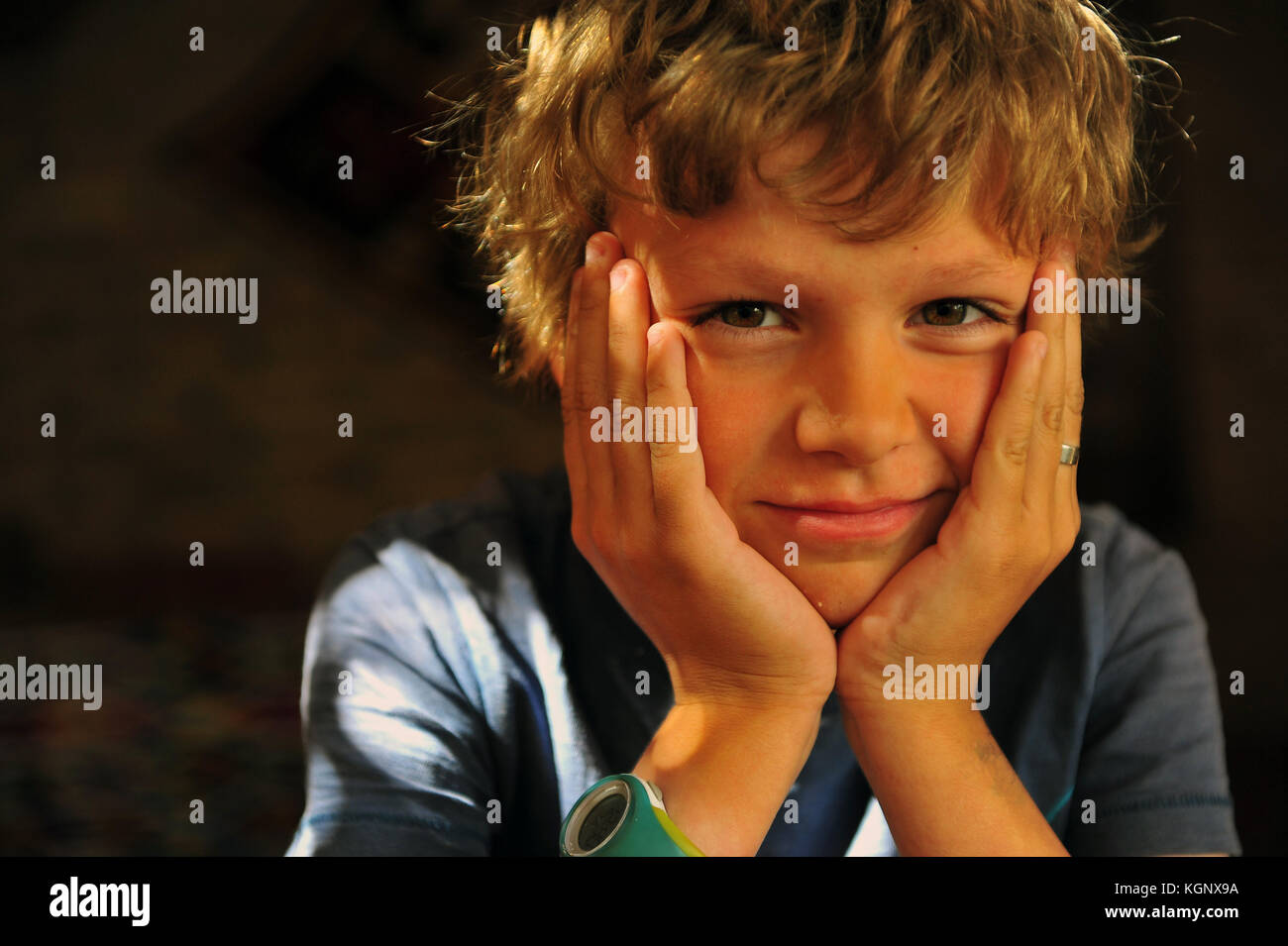 Pretty boy looking at camera Stock Photo - Alamy