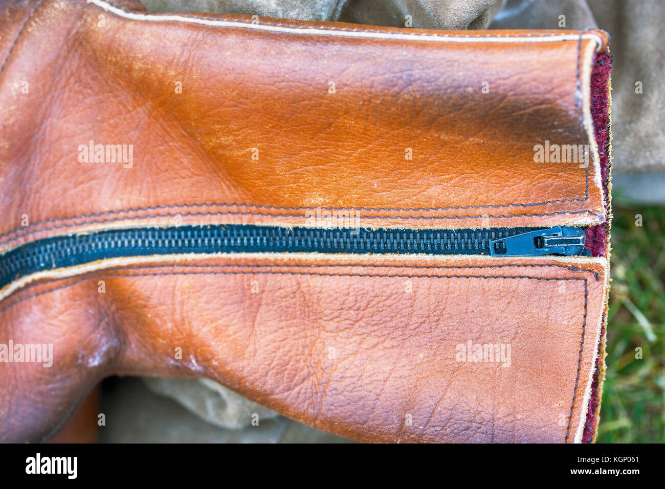 Brown leather shoe, closeup metal zipper Stock Photo - Alamy