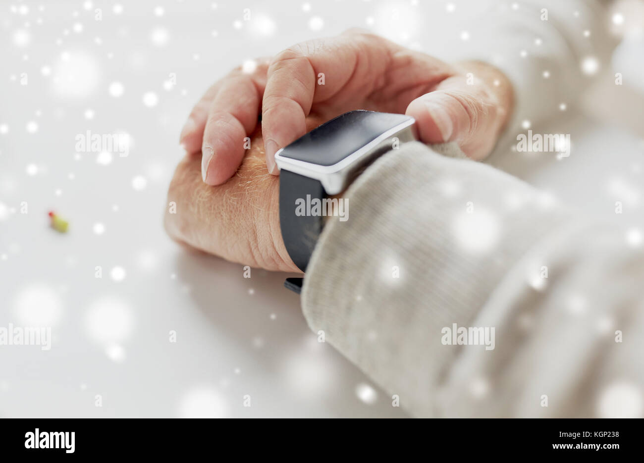close up of old man hand with pill and smart watch Stock Photo - Alamy