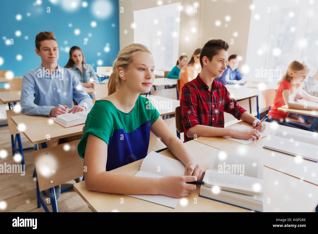 group of students with books at school lesson Stock Photo - Alamy